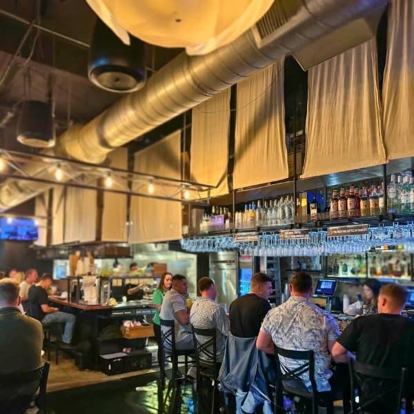 86 Forks Bar + Table | Visit Pensacola